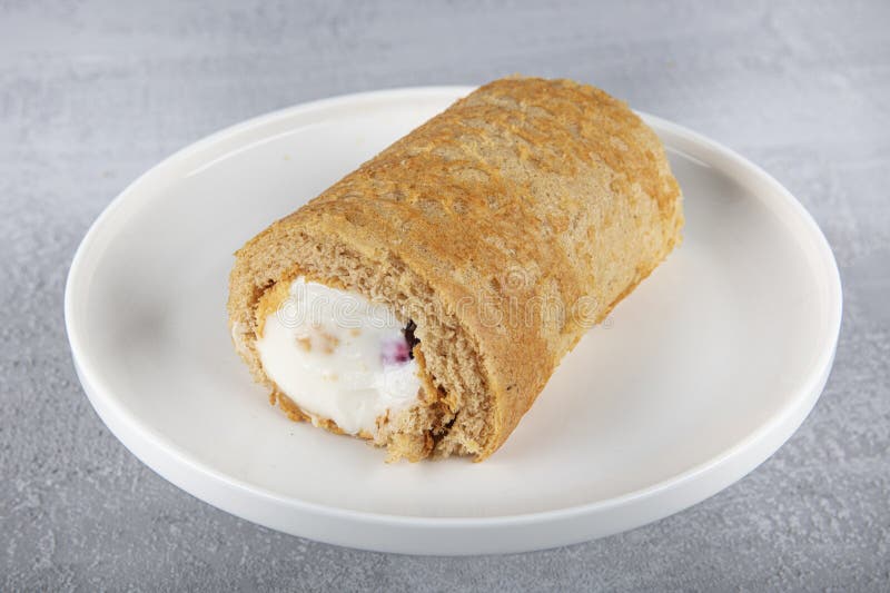 Sweet Roll Cake with Slice. Banana Roll Cake Stock Photo - Image of ...