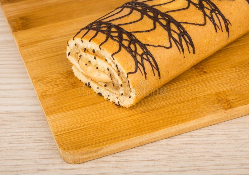 Sweet Roll Cake on Wooden Board Stock Photo - Image of meal, rolled ...