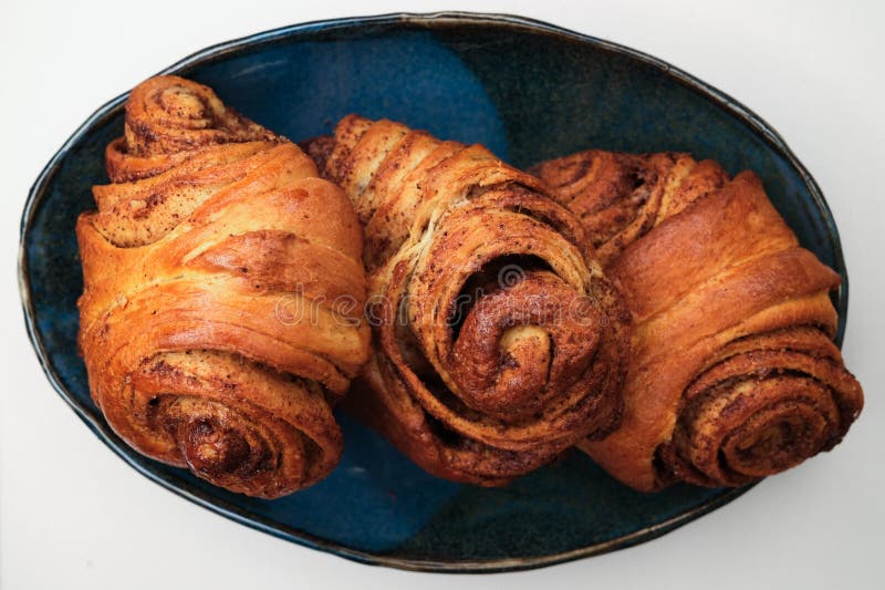 Sweet rolls on a plate stock photo. Image of dessert - 357397916