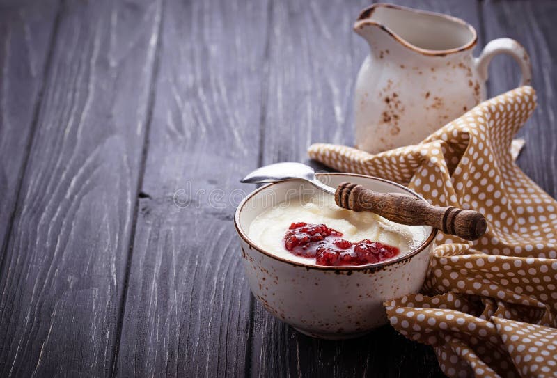 Sweet Semolina Porridge with Raspberry Jam Stock Image - Image of milk ...