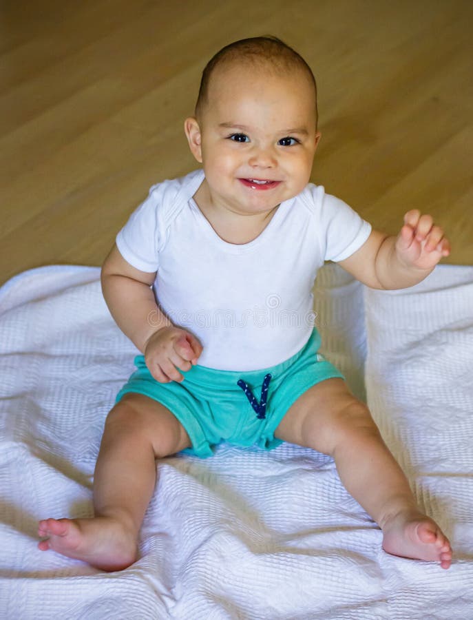 Sweet Smiling Baby on the Floor. Baby Boy at Home Stock Photo - Image ...