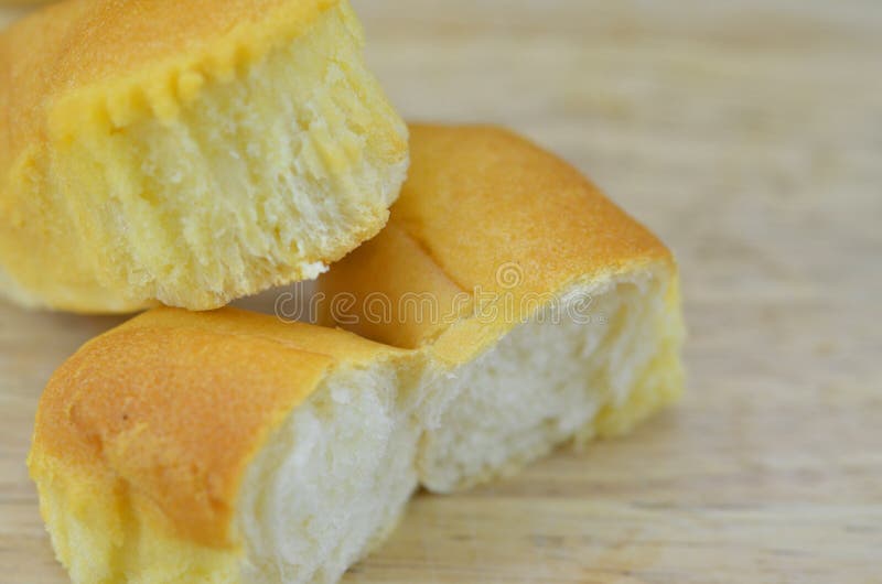 Sweet Soft Bread Open in Half on Wooden Background Stock Photo - Image ...