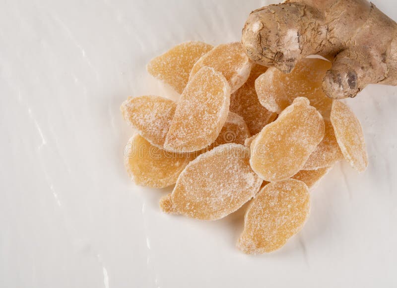 Sweet and Spicy Candied Ginger in a Bowl on Light Background Stock ...
