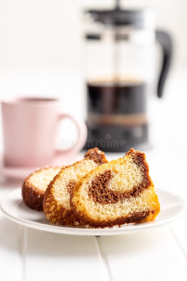 Sweet Sponge Cake. Bundt Cake on Plate on White Table Stock Image ...
