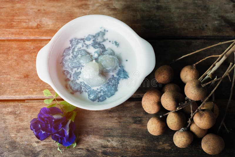 Sweet Sticky Rice with Longan and Coconut Milk Stock Photo - Image of ...