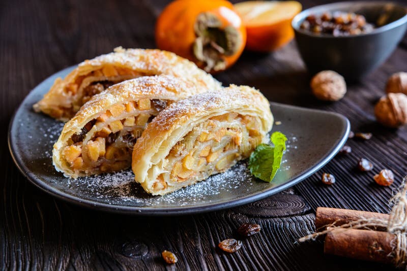 Sweet Strudel with Persimmons, Raisins and Walnuts Stock Image - Image ...