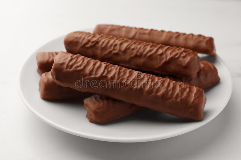 Sweet Tasty Chocolate Bars on White Table Stock Photo - Image of ...