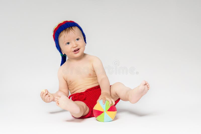 Sweet toddler with a ball stock image. Image of adorable - 41136275