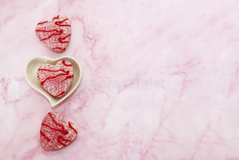 Sweet White Glazed Cookies in the Shape of a Heart with a Red Pattern ...