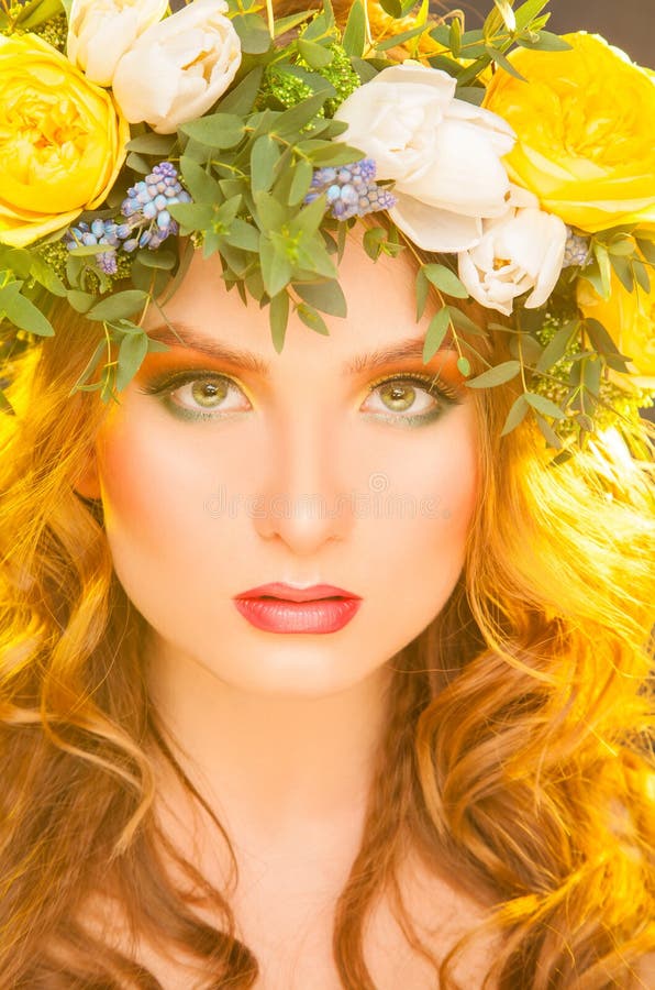 Sweet Woman with Flowers Looking at Camera Stock Photo - Image of ...