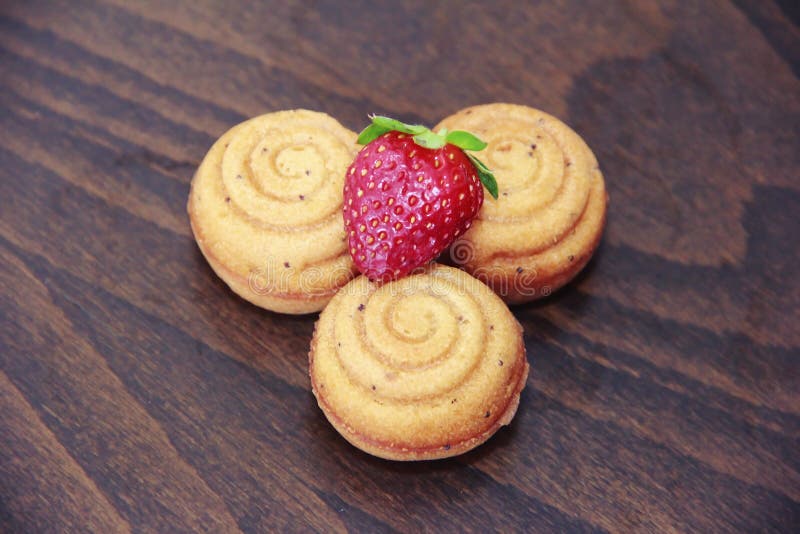 Sweet Yellow Biscuit Cakes Shells with Strawberry Decor Stock Photo ...