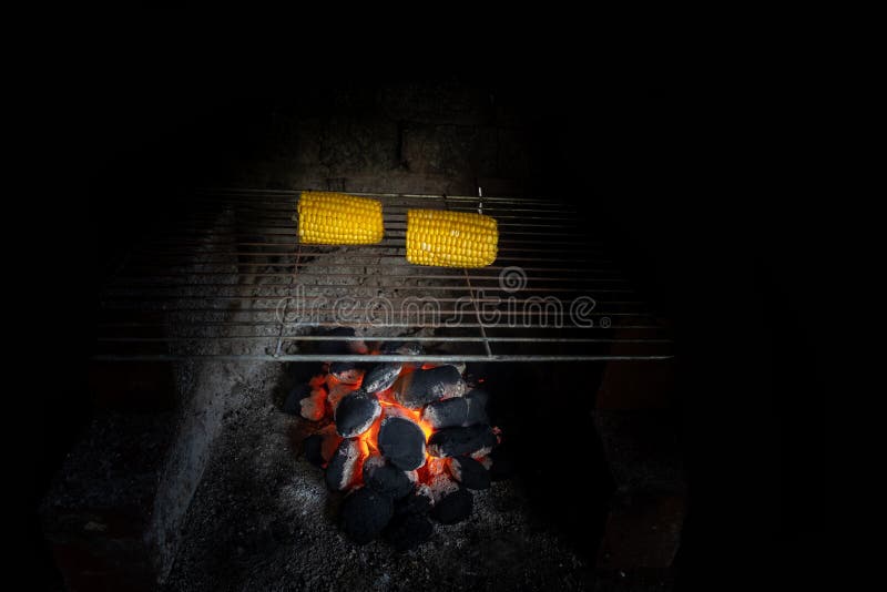Sweetcorn Cooking Over Glowing Coals Stock Photo - Image of grillen ...