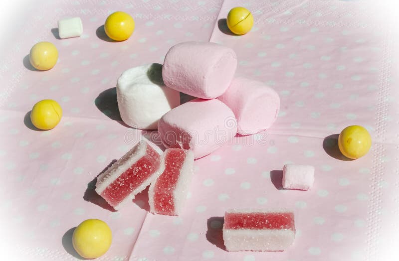 Sweeties on a pink surface stock photo. Image of petal - 192562808