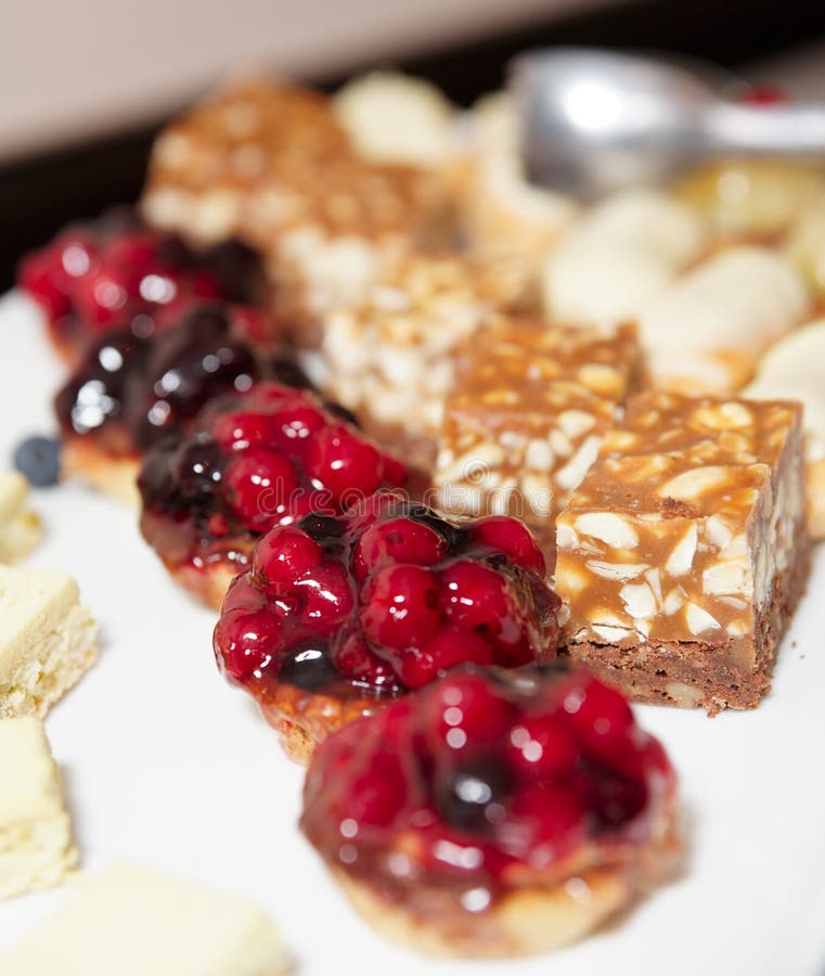 Sweets on banquet table stock photo. Image of platter - 17496534