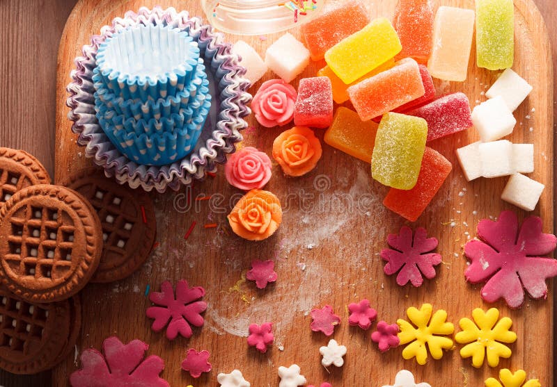 Sweets and Candies on a Wooden Table Stock Image - Image of lollipop ...