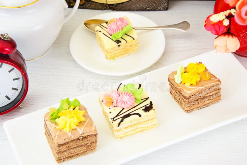 Sweets: Cream Cakes on Plate Stock Image - Image of icing, color: 64704903