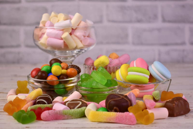 Sweets. Lots of Different Candies in Small Plates. Stock Photo - Image ...