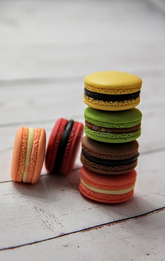 Sweets macrones in colour stock image. Image of orange - 270882445