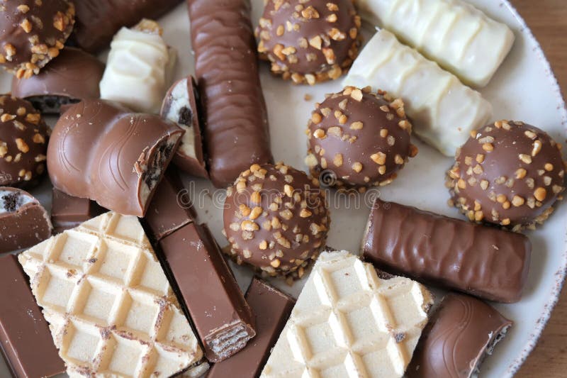 Sweets on a Plate. Chocolates and Wafers Stock Image - Image of sugar ...