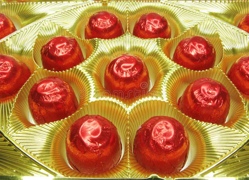 Sweets in Red Envelopment in Gold Box Stock Photo - Image of pastry ...