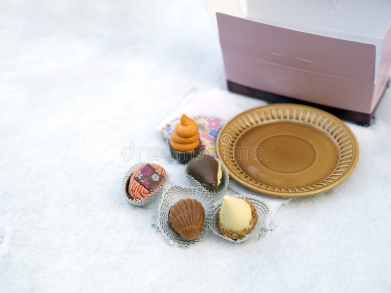Sweets on Snow stock photo. Image of winter, chocolate - 64250370