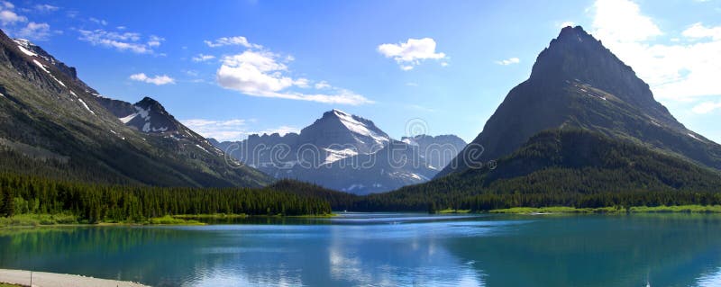 Swiftcurrent lake stock photo. Image of park, mountains - 28289040