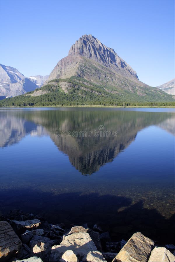 Swiftcurrent Lake stock photo. Image of color, horizon - 7346344