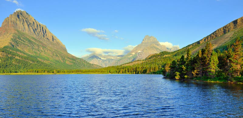 Swiftcurrent Lake in Glacier National Park Stock Photo - Image of ...