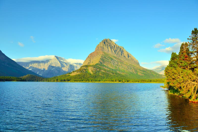 Swiftcurrent Lake in Glacier National Park Stock Image - Image of quiet ...