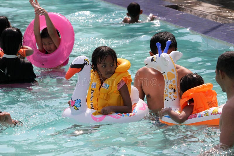 Swim editorial photo. Image of learn, java, pool, central - 57035011