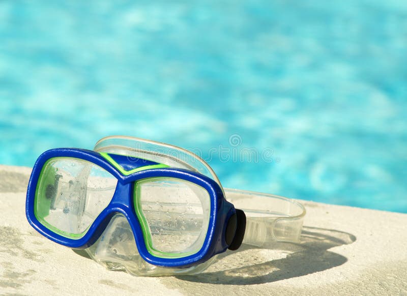 Swim mask by the pool stock photo. Image of recreation - 2580566