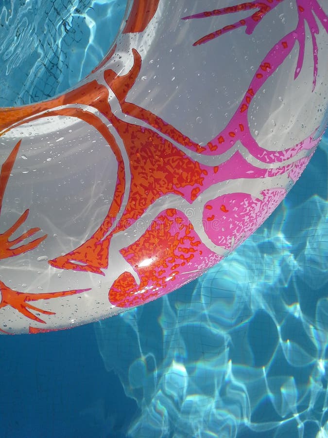 Swim ring at the pool stock photo. Image of background - 43870476