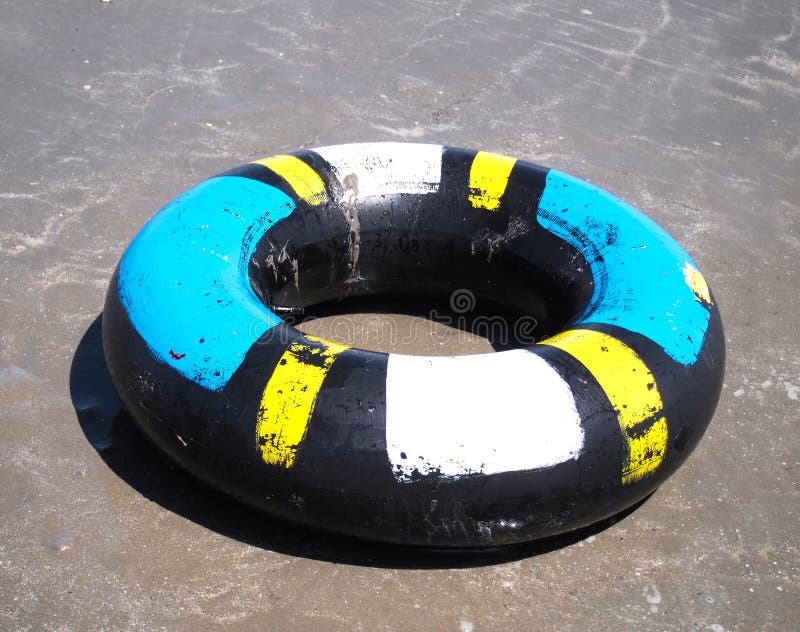 Rubber Swim Ring on the Beach. Stock Photo - Image of security ...