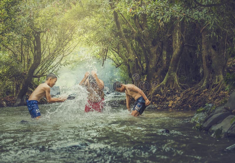 Swim in the stream stock image. Image of childhood, beautiful - 67311177