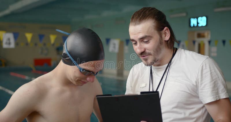 Male Swimming Coach Going By The Swimming Pool Stock Video Video Of