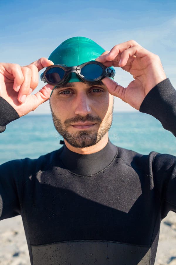 Swimmer Getting Ready at the Beach Stock Image - Image of goggles ...