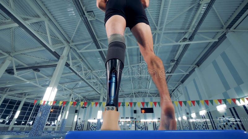 A Swimmer with a Leg Prosthesis, Bottom View. Stock Video - Video of ...