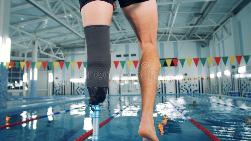 Male Swimmer with Leg Prosthesis, Back View. Stock Footage - Video of ...