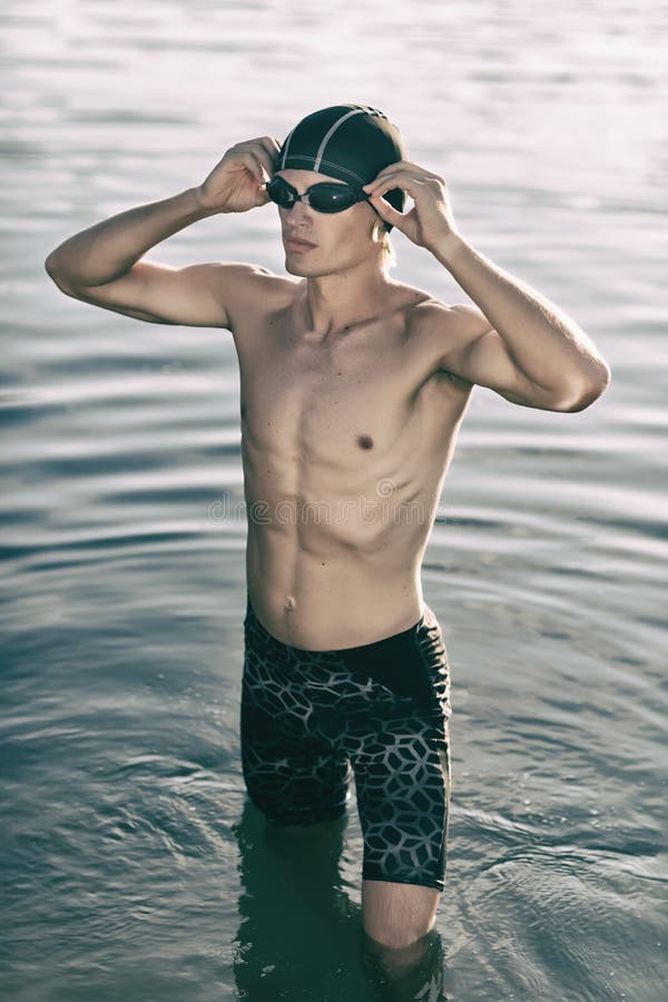 Swimmer model in a sea stock photo. Image of healthy - 127912108