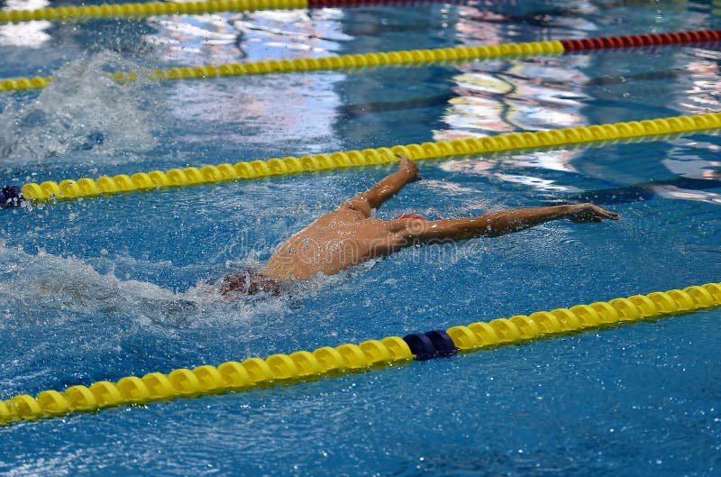 Swimmer in a outdoor pool editorial photo. Image of race - 177166311