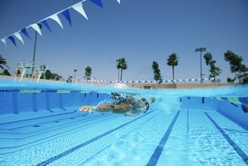 Swimmer Practicing in Pool stock image. Image of race - 29661477