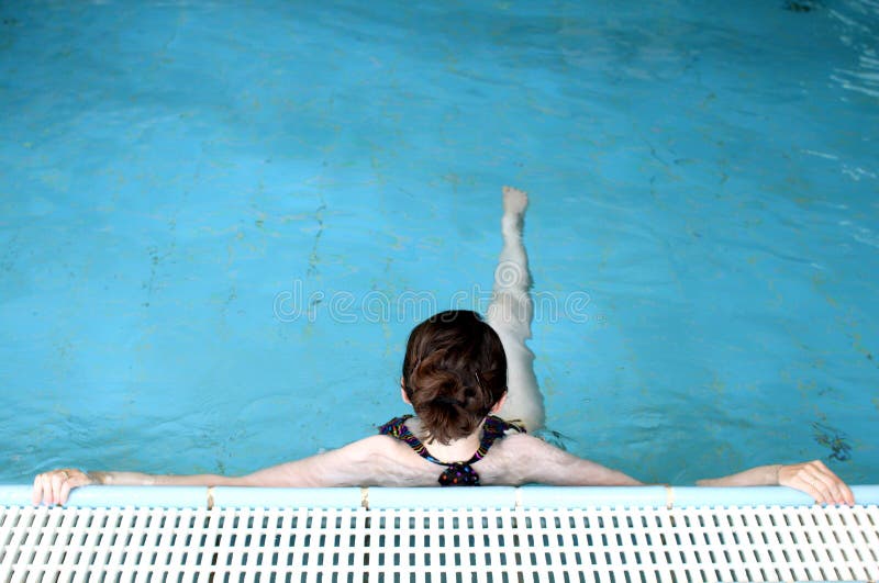 Swimmer relaxing in pool stock photo. Image of relaxation - 26125738