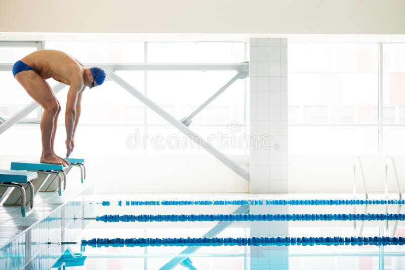 Swimmer Standing on Starting Block Stock Image - Image of professional ...