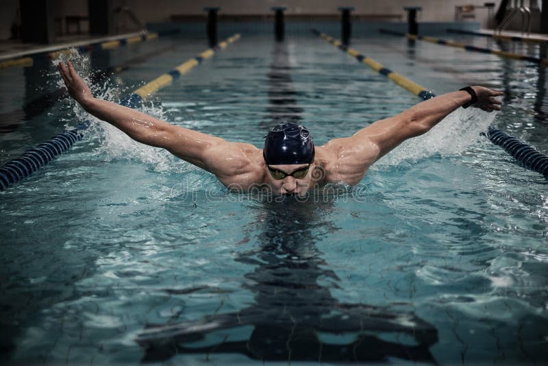 Swimmer in swimming pool stock photo. Image of glasses - 61289786