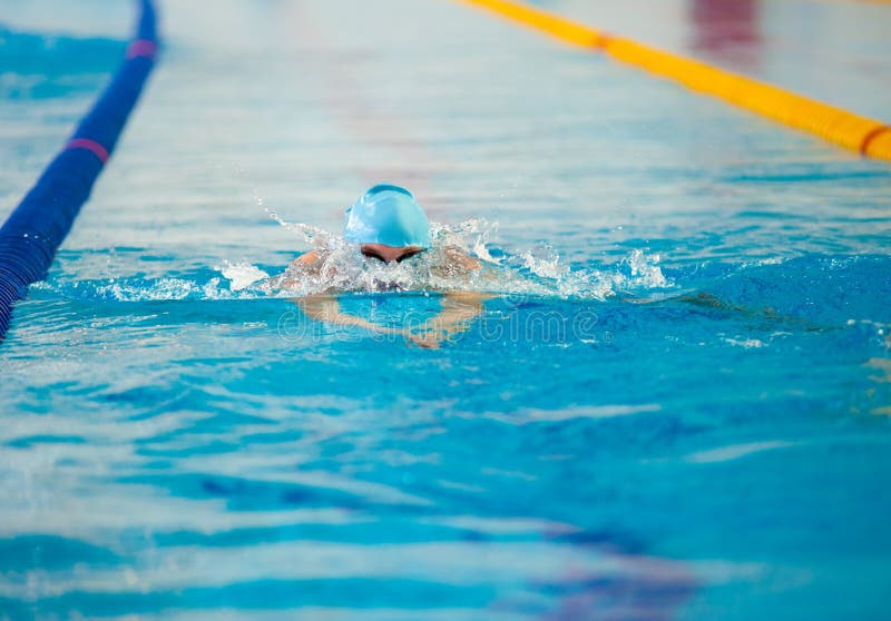 Swimmer swims in water stock photo. Image of active, busy - 23965578