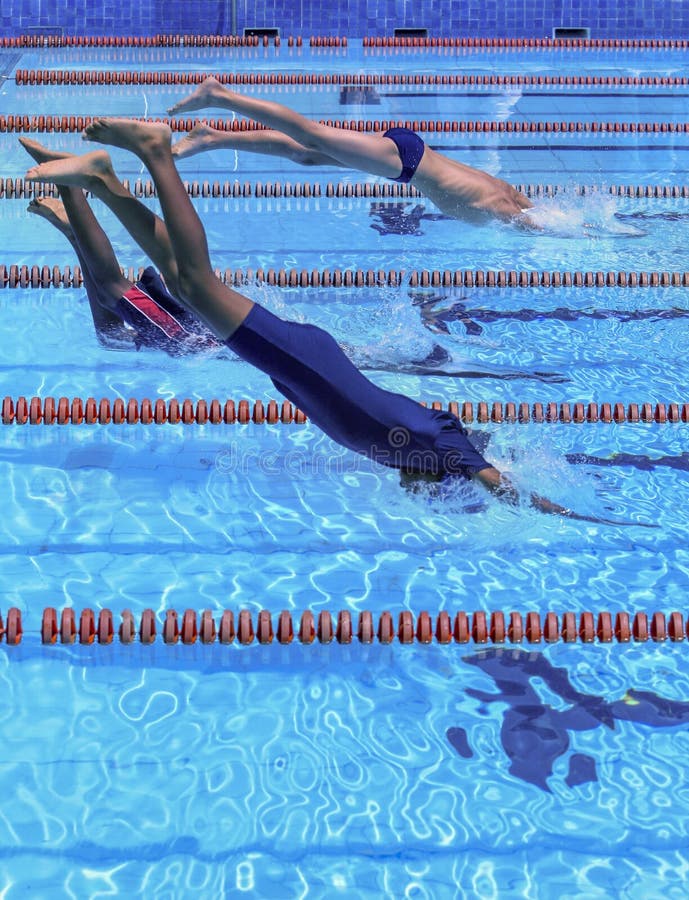 Swimmers jumping stock photo. Image of group, compete - 233171996