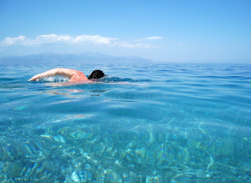 Man Floating in a Dead Sea with Newspaper Stock Photo - Image of ...