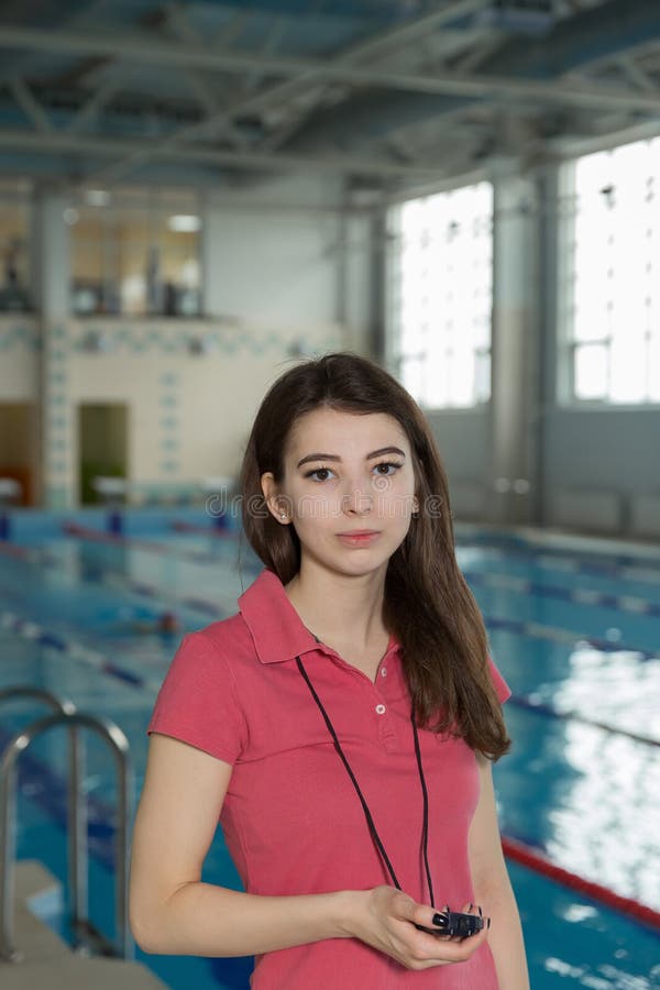 Swimming Coach Standing Poolside at the Leisure Center Stock Image ...