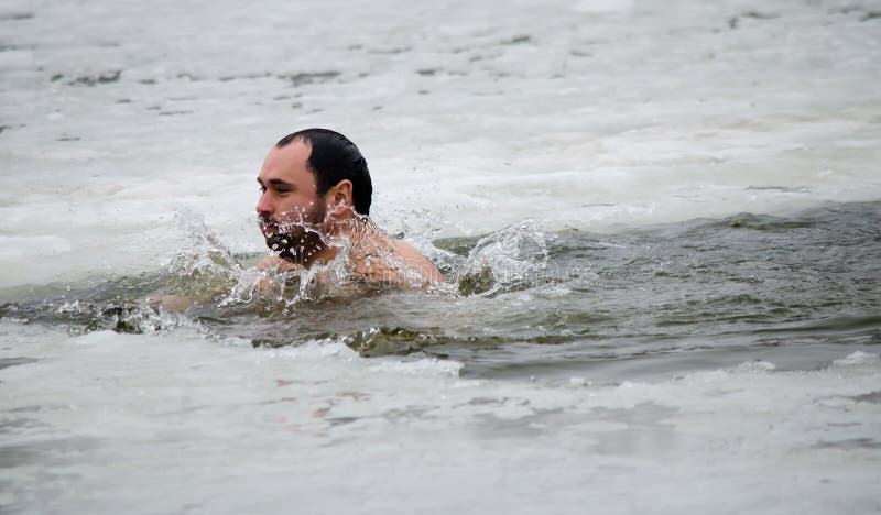 Swimming in the Ice-hole. Feast of the Epiphany Editorial Stock Photo ...