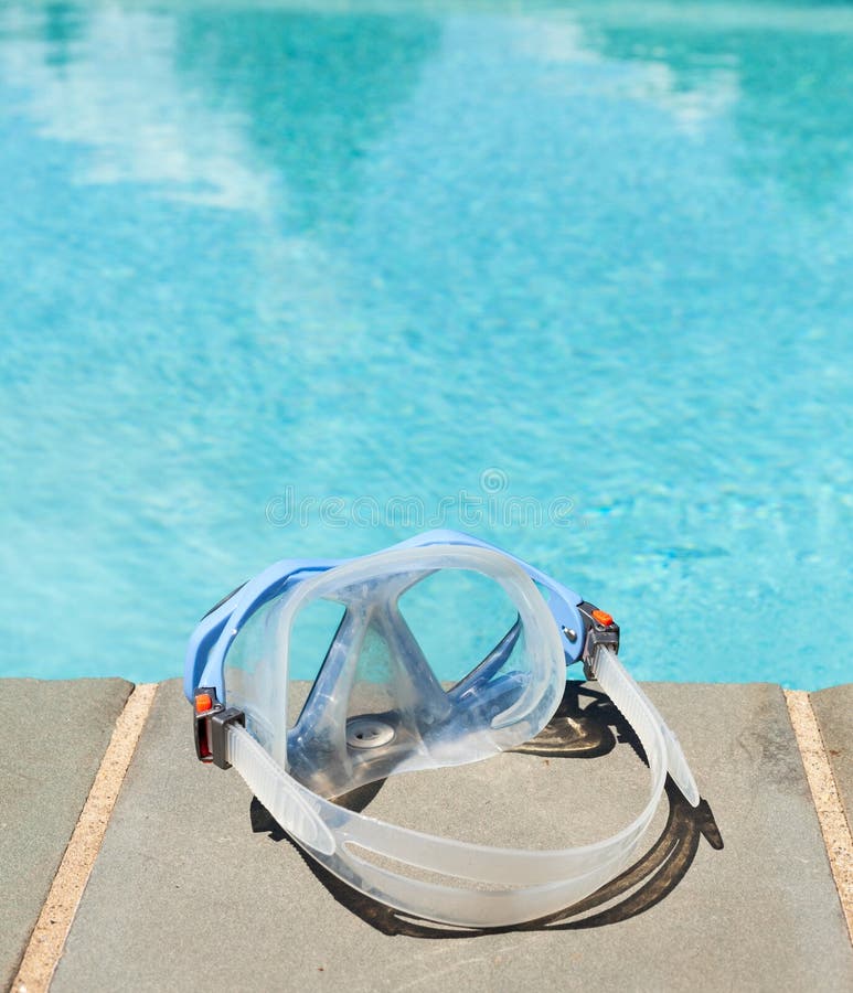 Swimming Mask by Side of Blue Pool Stock Image - Image of summertime ...